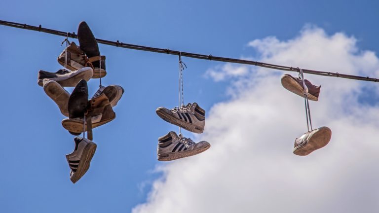 “What’s the Story Behind Shoes Hanging from Power Lines? The Surprising ...